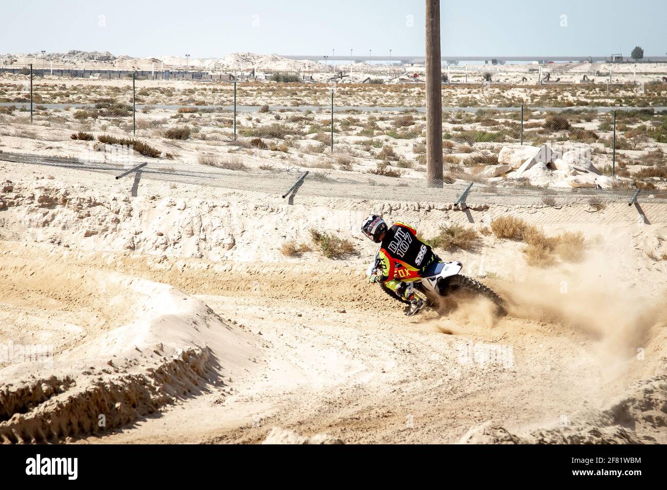 DUBAI, UNITED ARAB EMIRATES - Jan 30, 2021: Motorcross riders on sand ...