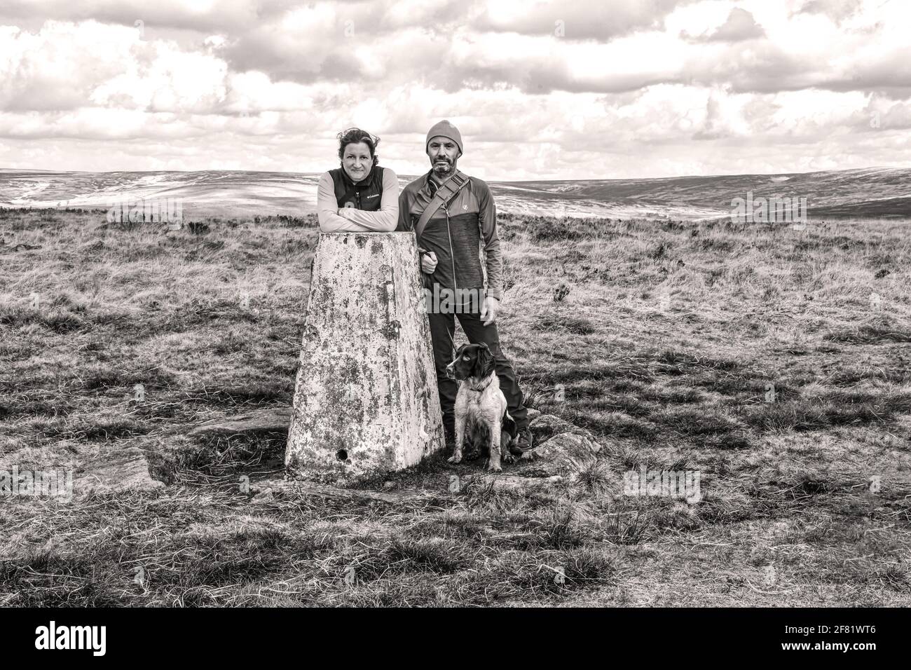 Couple with springer spaniel Trig Point, Standing Stone Hill ...