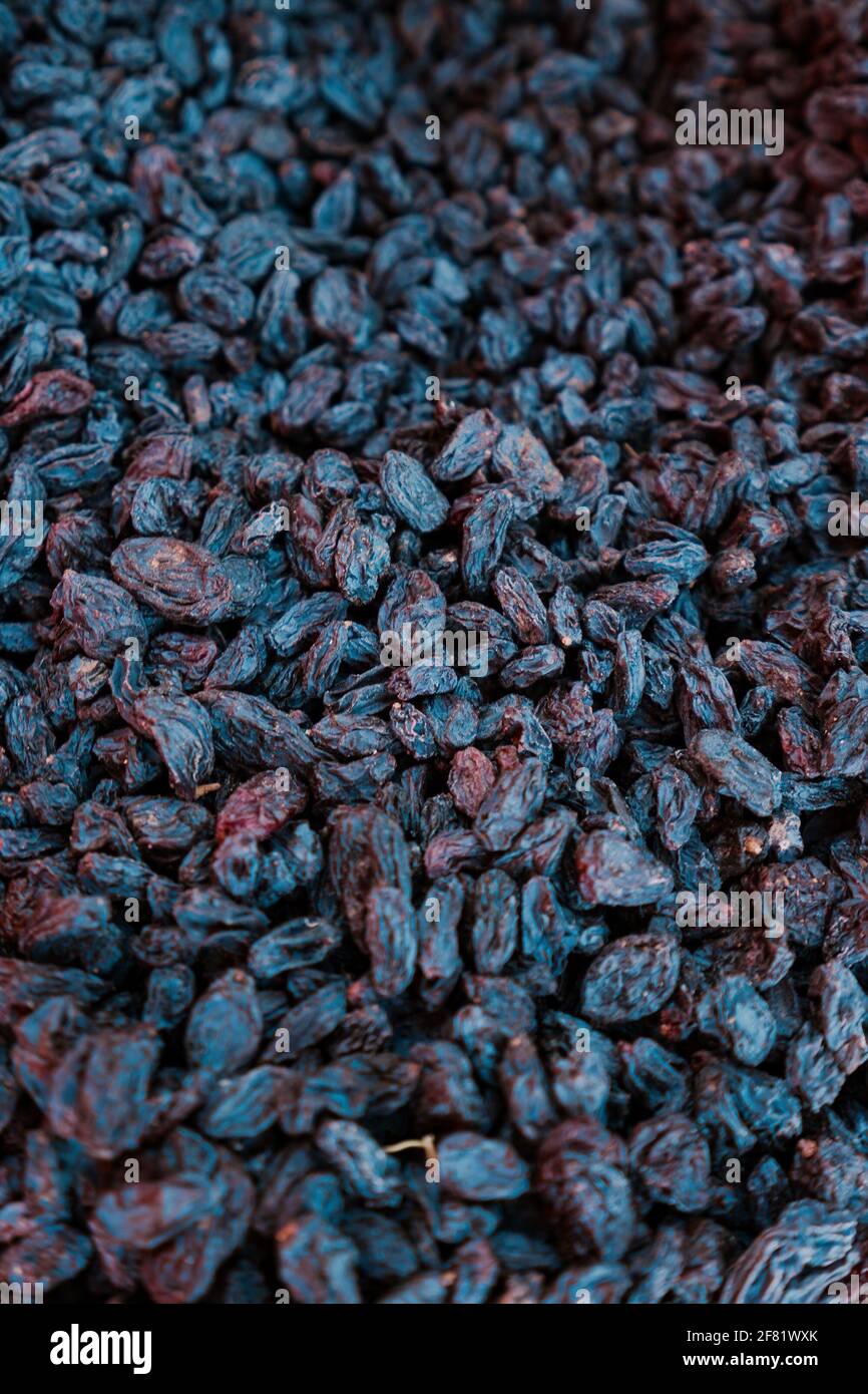 Raisins as an abstract background texture Stock Photo - Alamy
