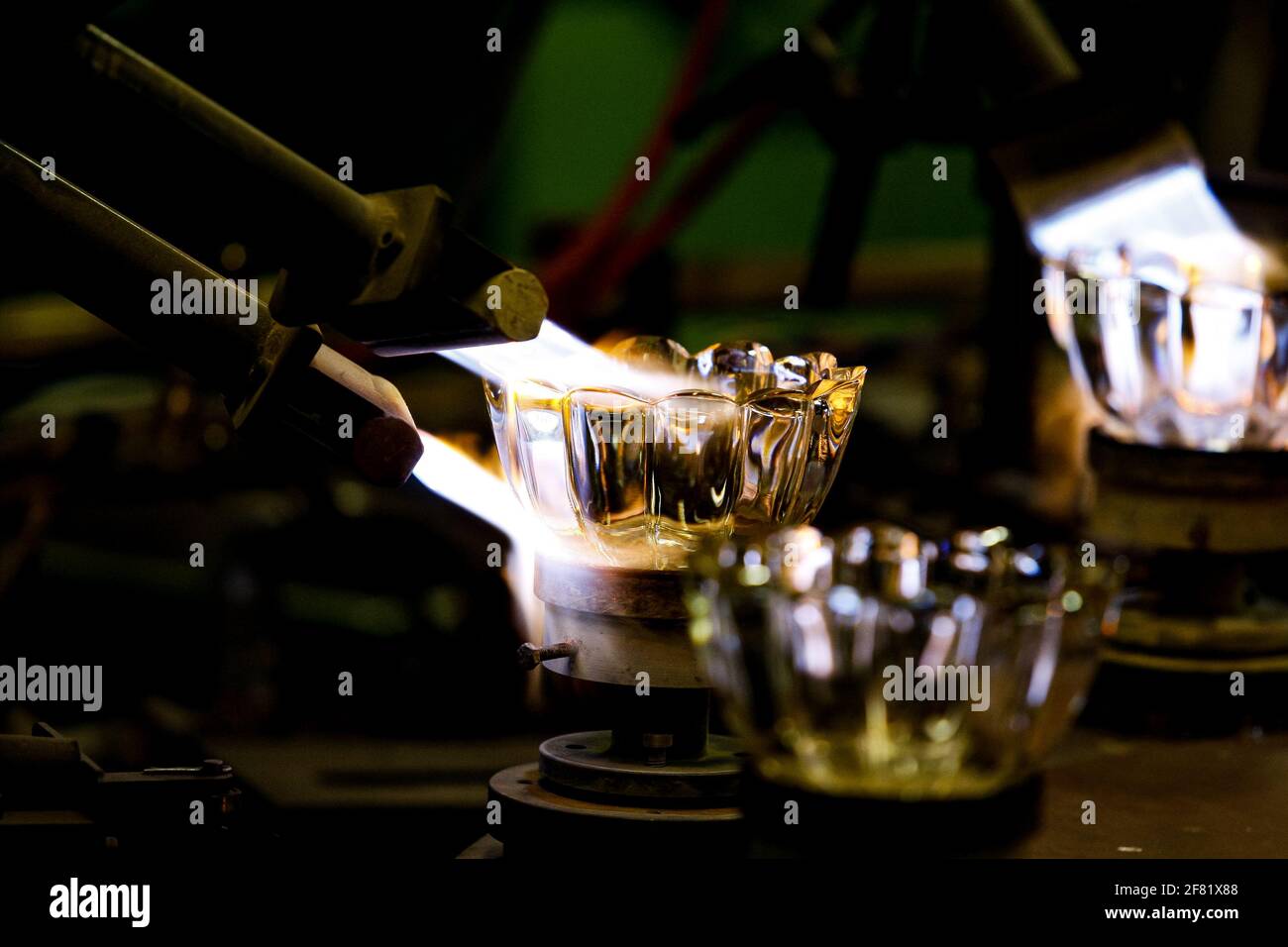 A glass master creates a vase. Neman plant, glass blowers, Berezovka ...