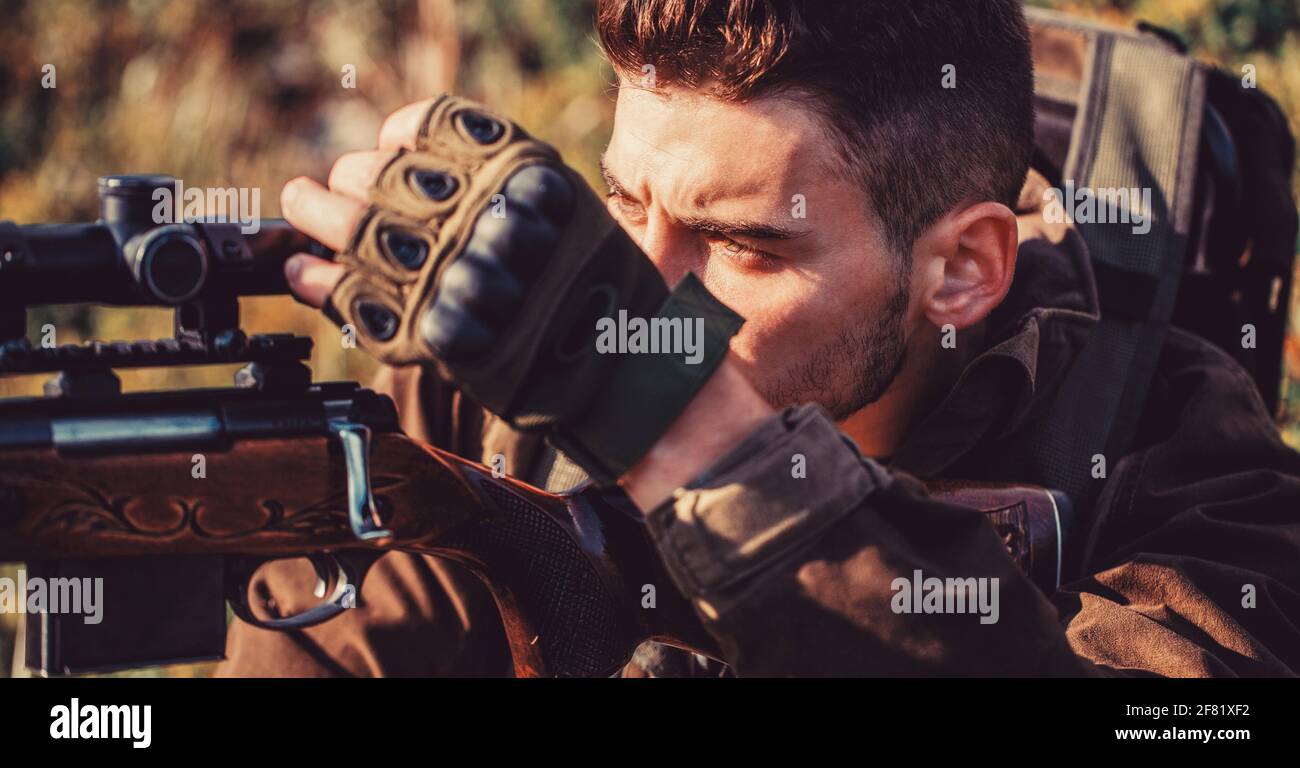 Hunter man. Hunting period. Male with a gun. Close up. Hunter with ...