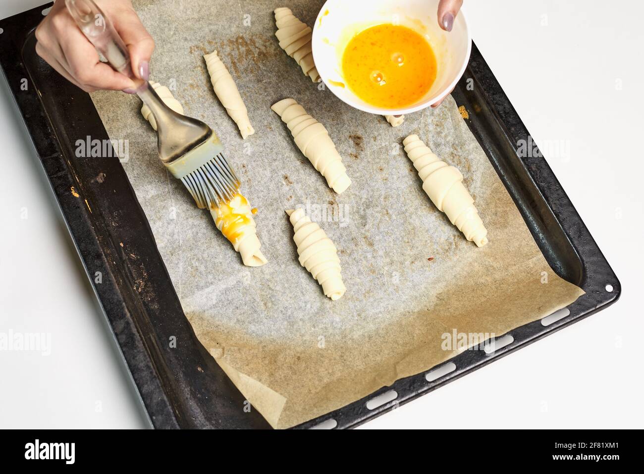 The process of making homemade pumpkin croissant rolls Stock Photo - Alamy