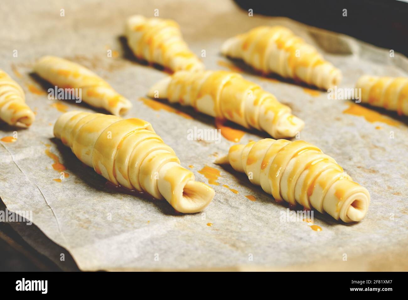 The process of making homemade pumpkin croissant rolls Stock Photo - Alamy