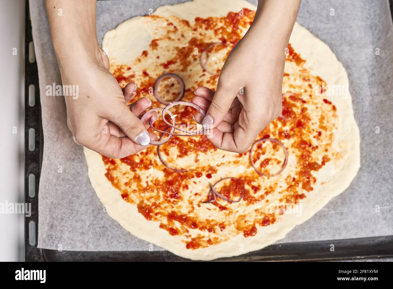 The process of making a delicious homemade pizza Stock Photo - Alamy