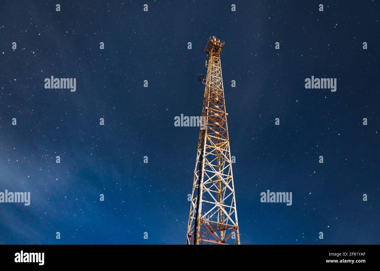 Cellular tower against background winter night sky Stock Photo - Alamy