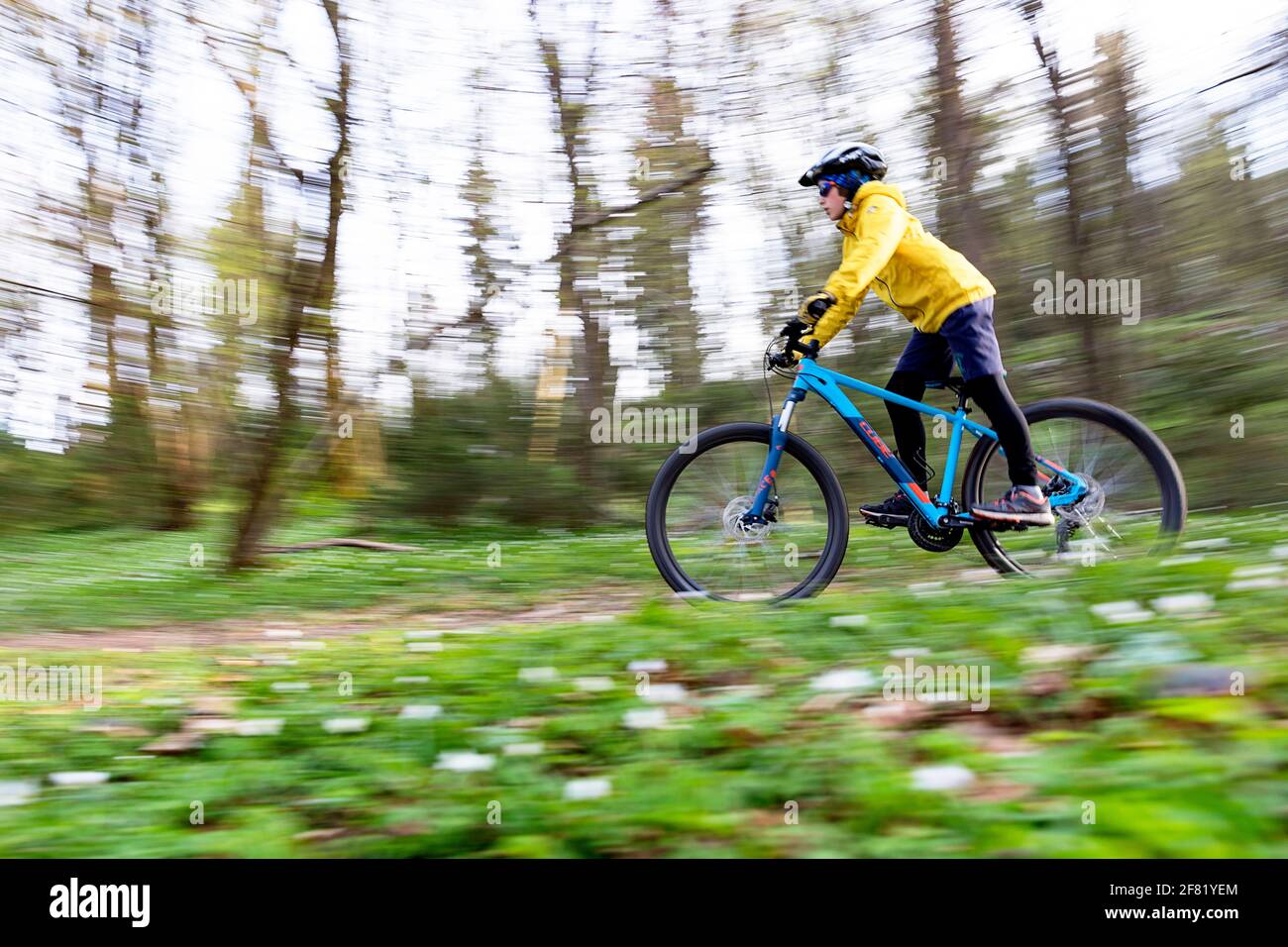 Boy Riding Bike Motion Blur High Resolution Stock Photography and ...