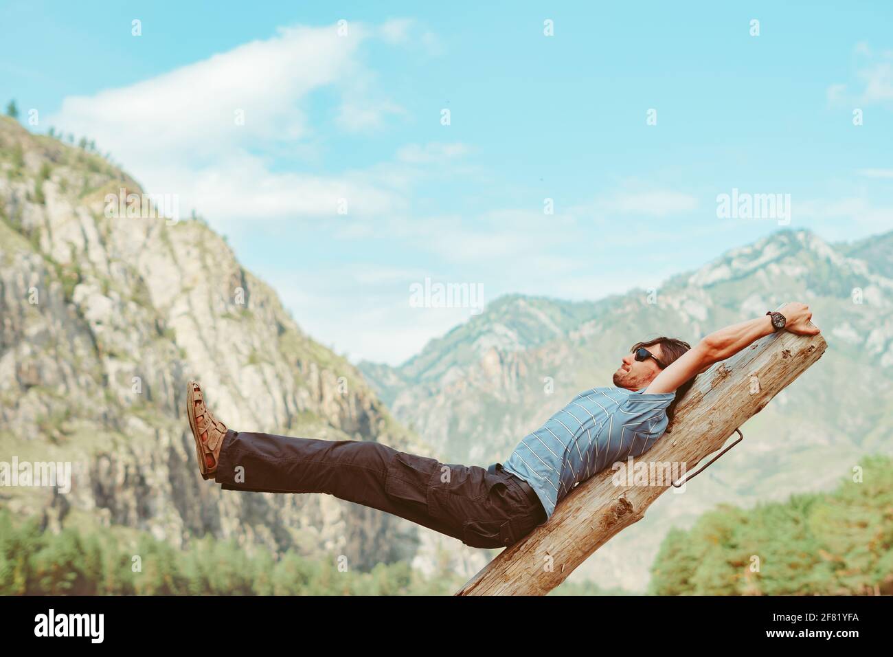Man lying down on a log hi-res stock photography and images - Alamy
