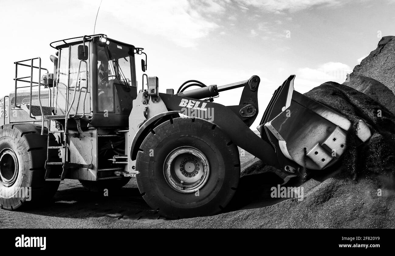 Front end loader loading Black and White Stock Photos & Images - Alamy