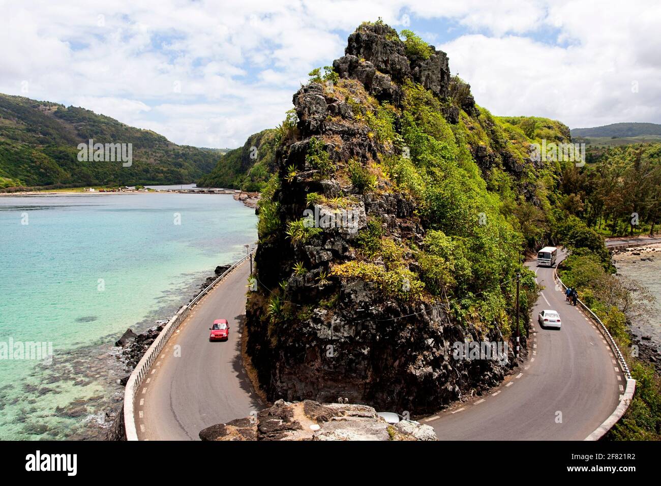 Hair-pin bend around a rock in Baie du Cap,Maconde view point. Coastal ...