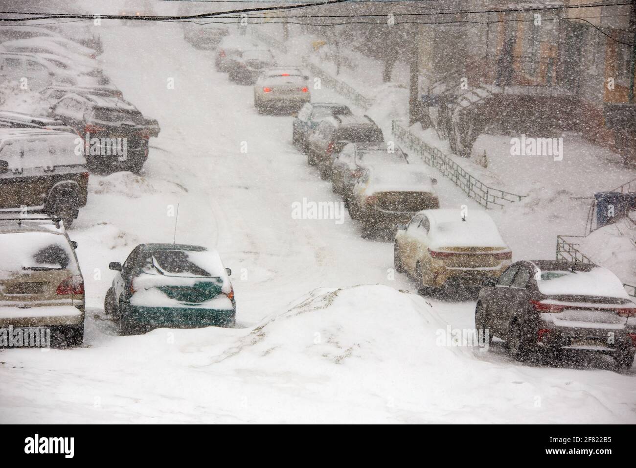 blizzard at parking near apartment building in winter russia Stock ...