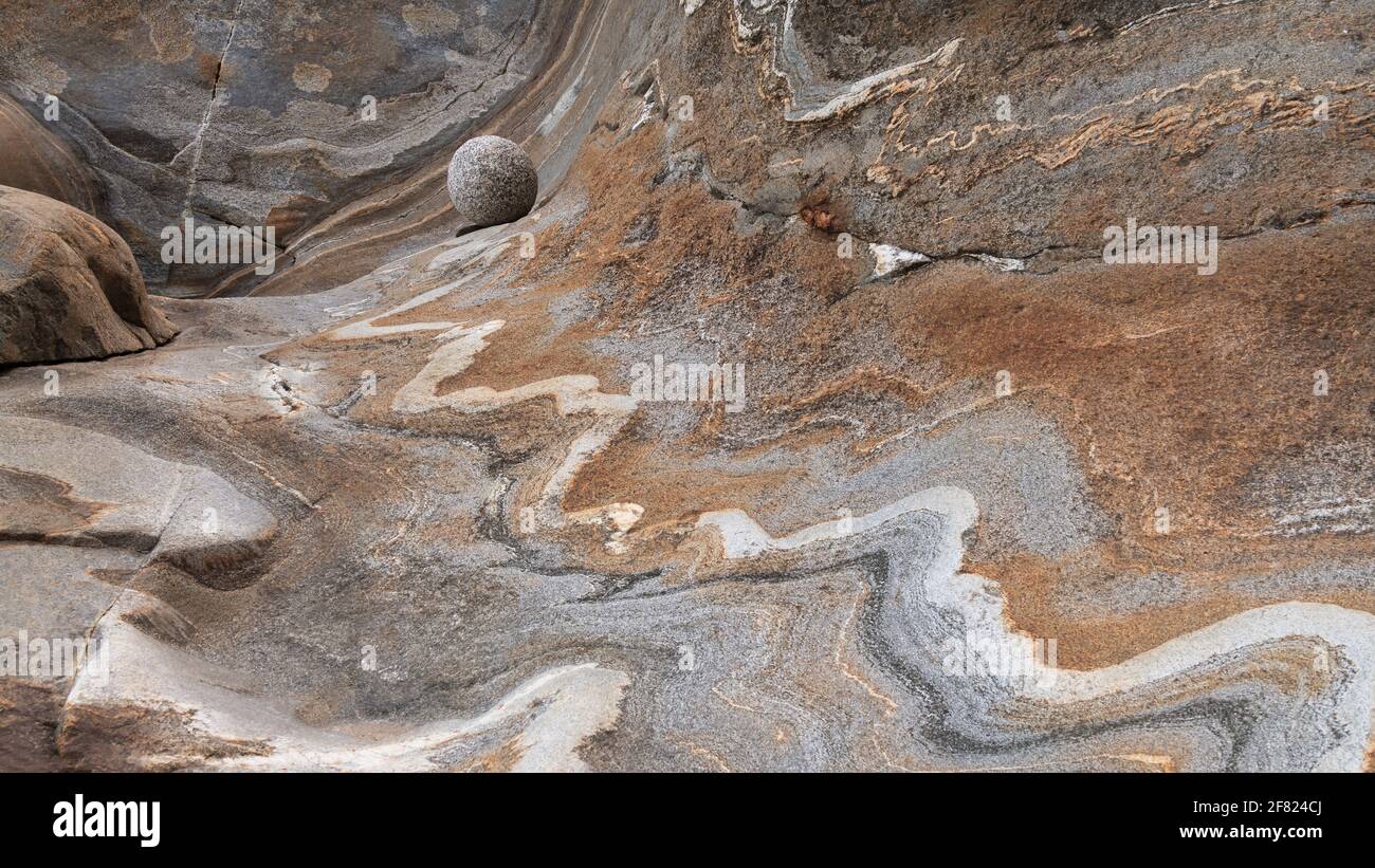 A protected stone ball in natural glacial mill with beautiful textures ...