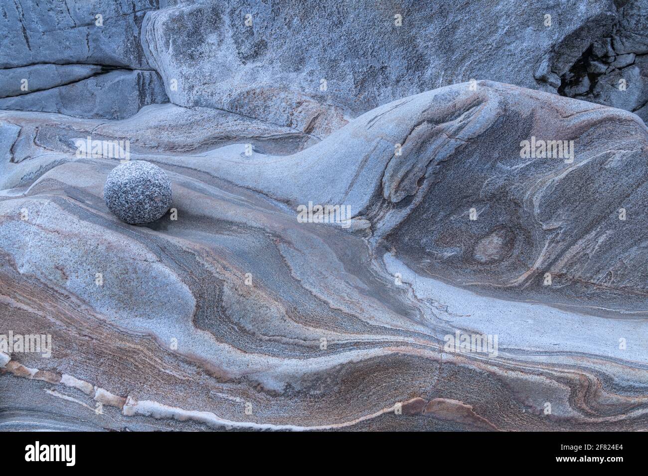 A protected stone ball in natural glacial mill with beautiful textures ...