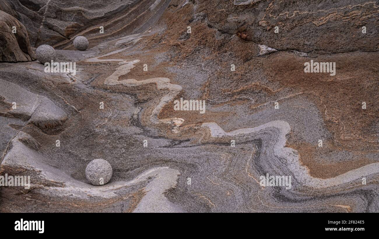 A protected stone ball in natural glacial mill with beautiful textures ...