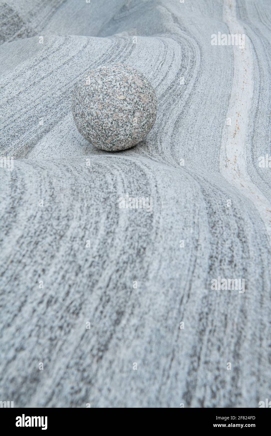A protected stone ball in natural glacial mill with beautiful textures ...