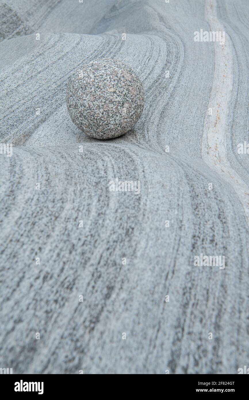 A protected stone ball in natural glacial mill with beautiful textures ...
