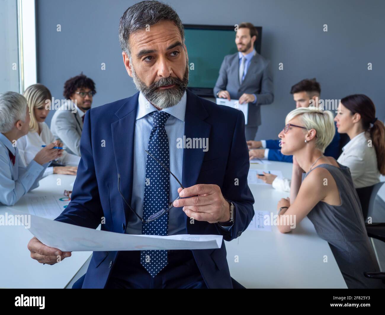 Corporate business team and manager in a meeting Stock Photo - Alamy