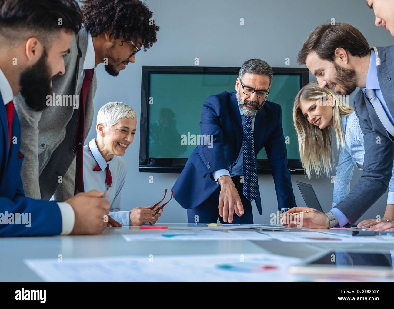 Corporate business team and manager in a meeting Stock Photo - Alamy