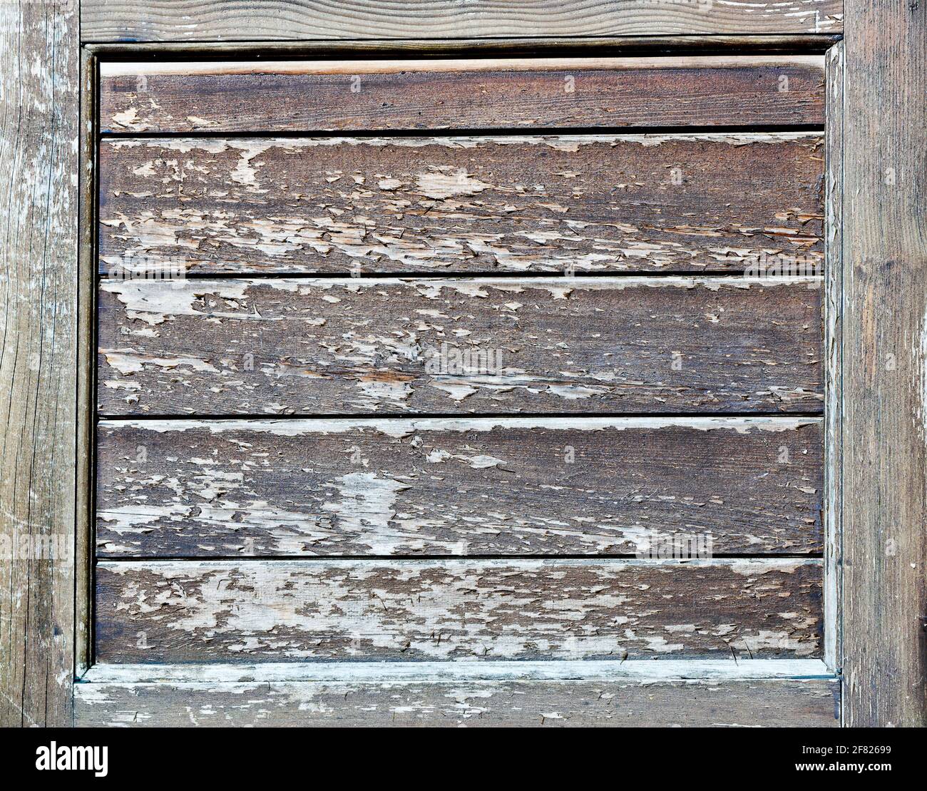 Horizontal panels of heavily weathered wood in a square frame Stock ...