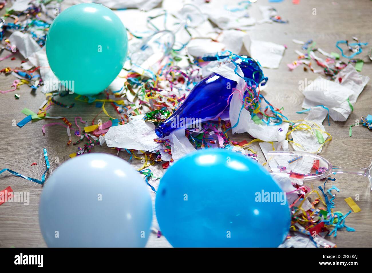 Top view of floor with after a party celebration with empty blue ...