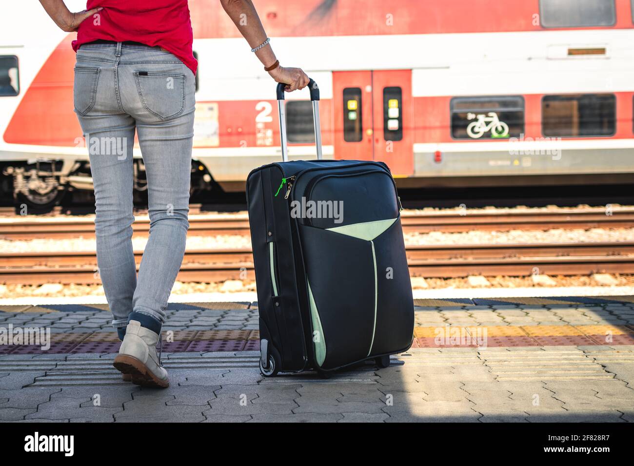Dragging heavy bag hi-res stock photography and images - Alamy