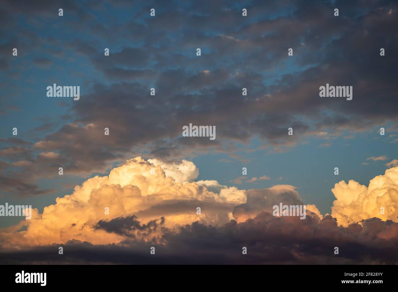 Dramatic sky before storm. Cumulonimbus during sunset. Top of cumulus ...