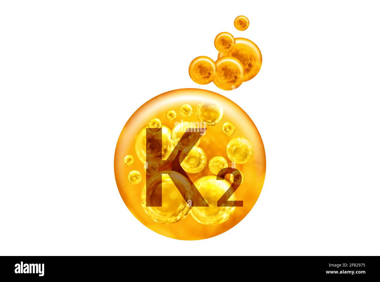 Vitamin K2 capsule. Golden balls with bubbles isolated on white ...