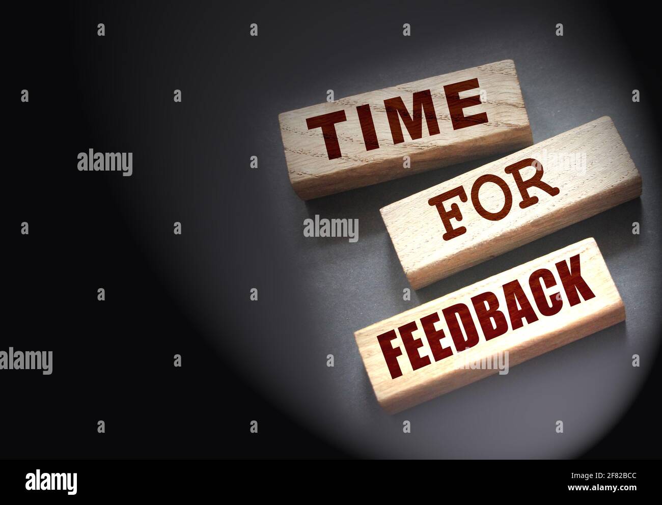Time fir feedback text on wooden blocks. Product or service evaluation ...