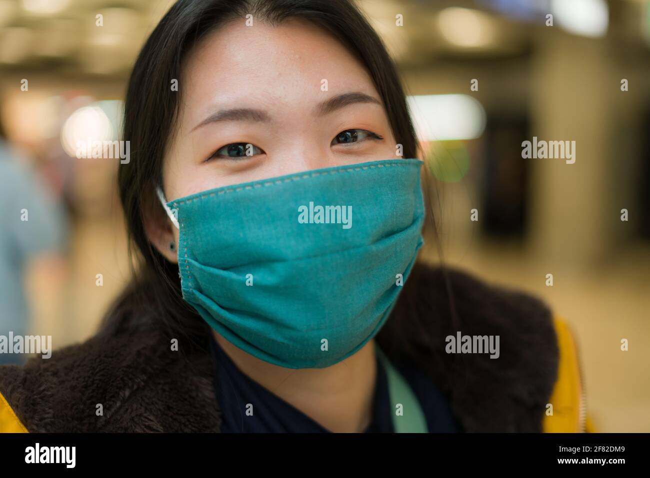 Asian woman flying in covid19 times - lifestyle portrait of young happy ...
