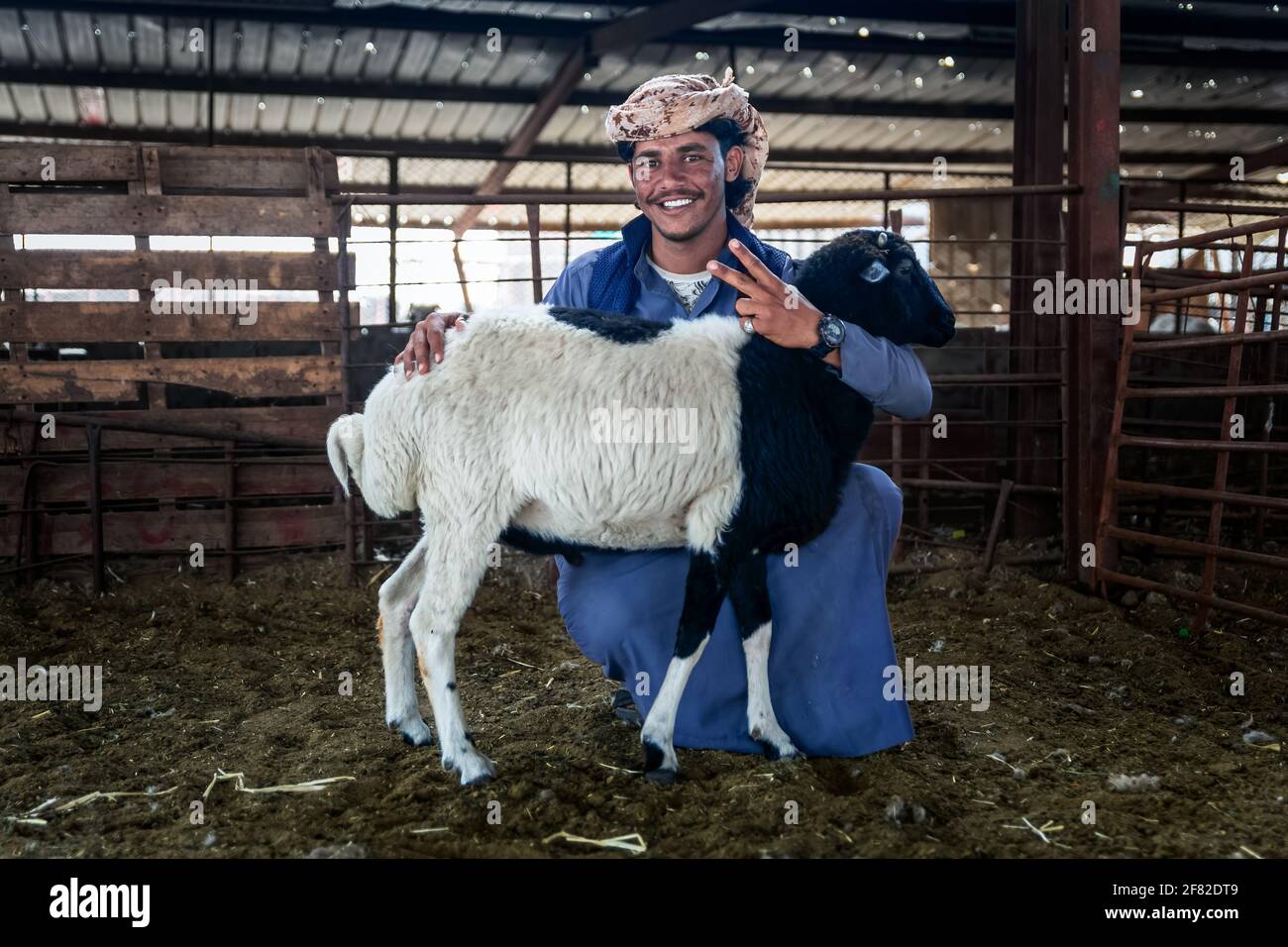 Dammam, Saudi Arabia - 02-April-2021. Young adult man with his goat on ...