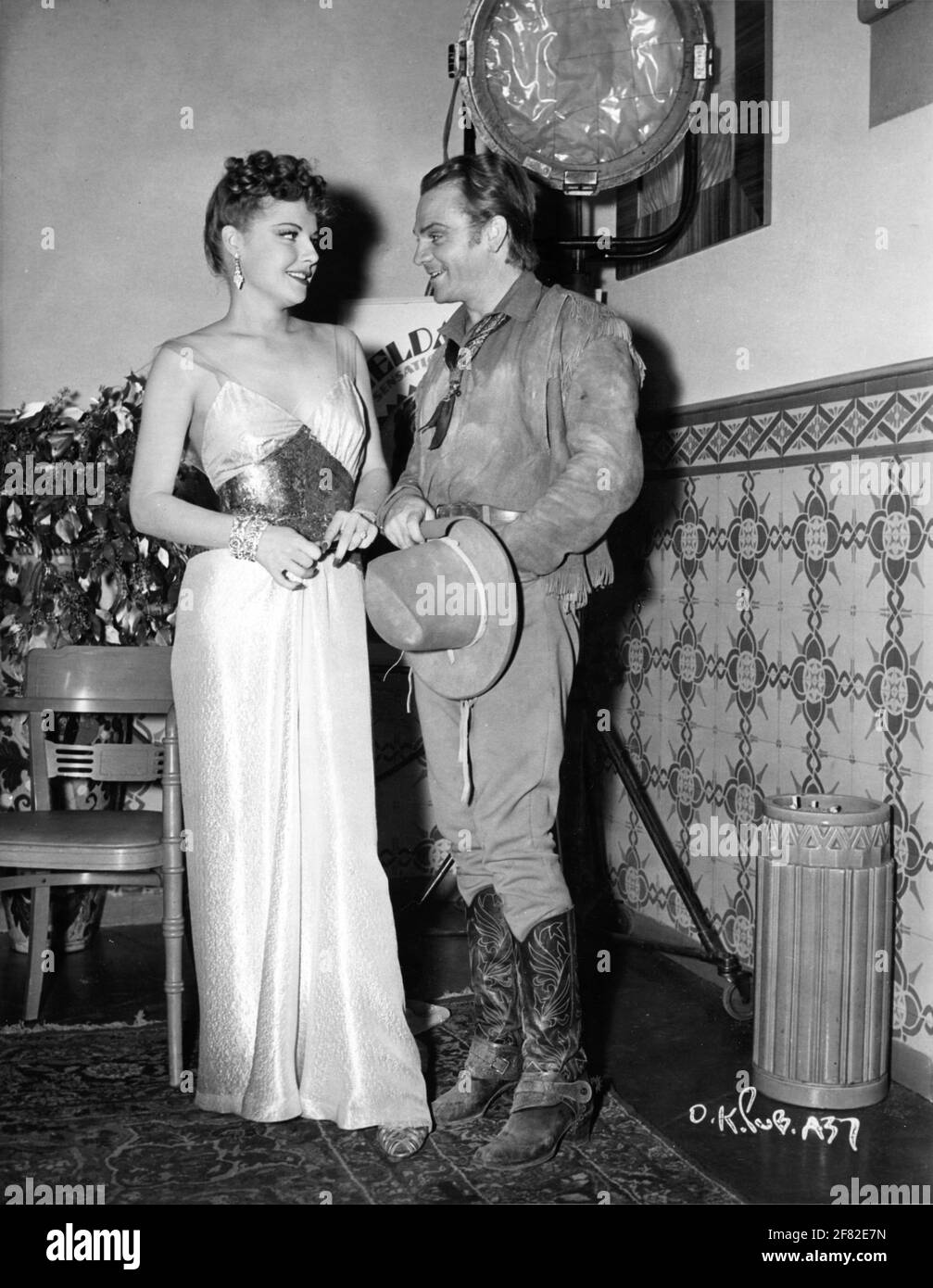 JAMES CAGNEY candid visiting ANN SHERIDAN on adjoining sound stage on ...