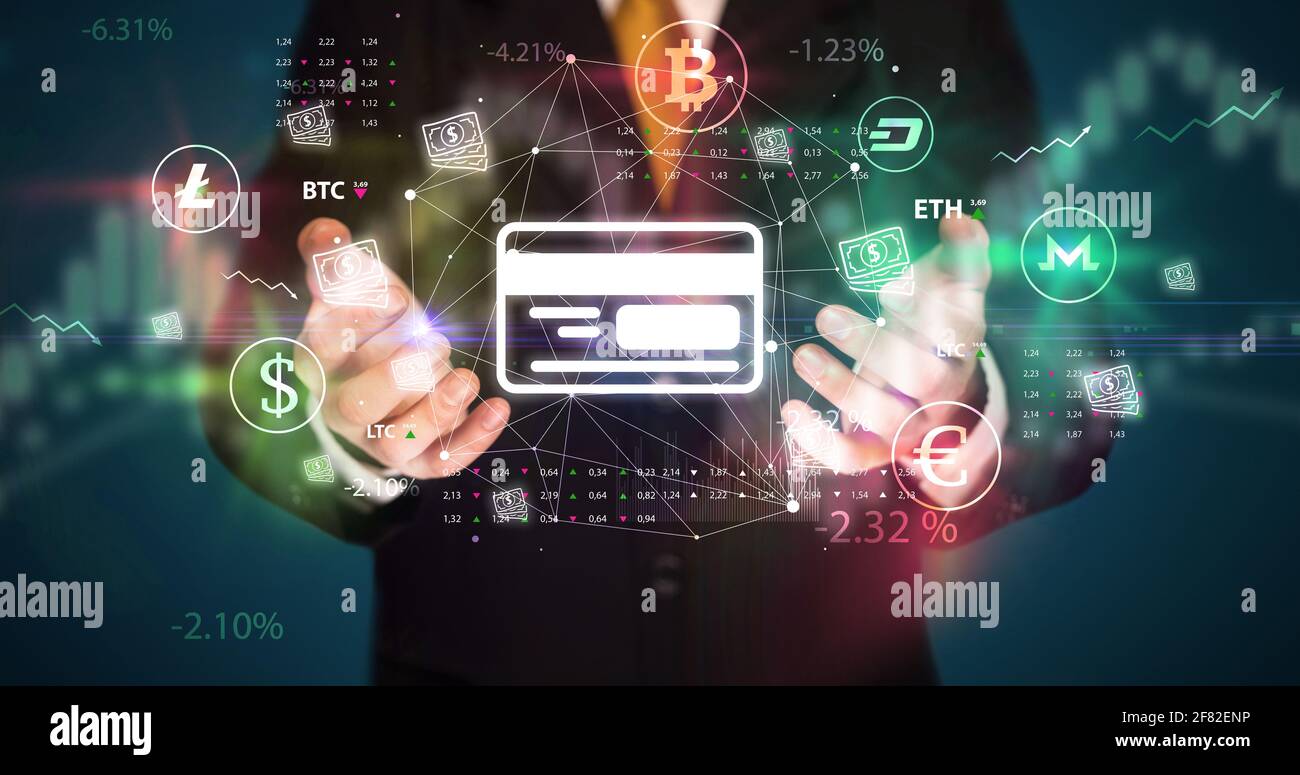 Businessman holding currency symbols concept Stock Photo - Alamy
