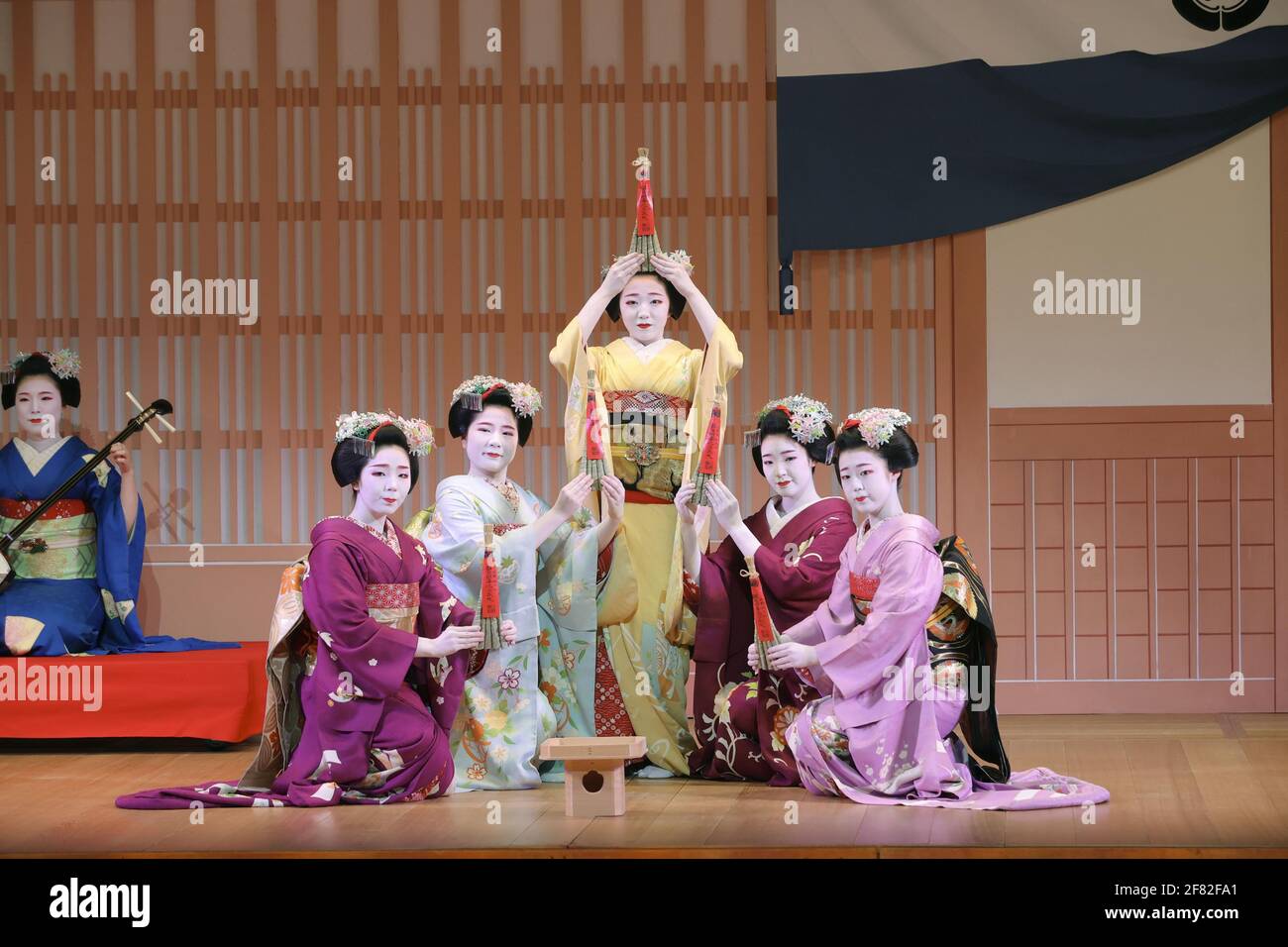 "Geiko" female entertainers and "maiko" apprentices dance at a theater ...