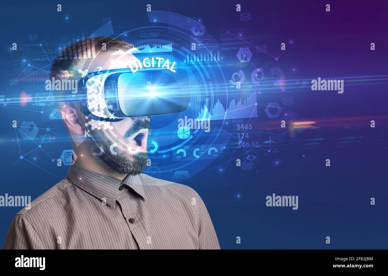 Businessman looking through VR glasses Stock Photo - Alamy
