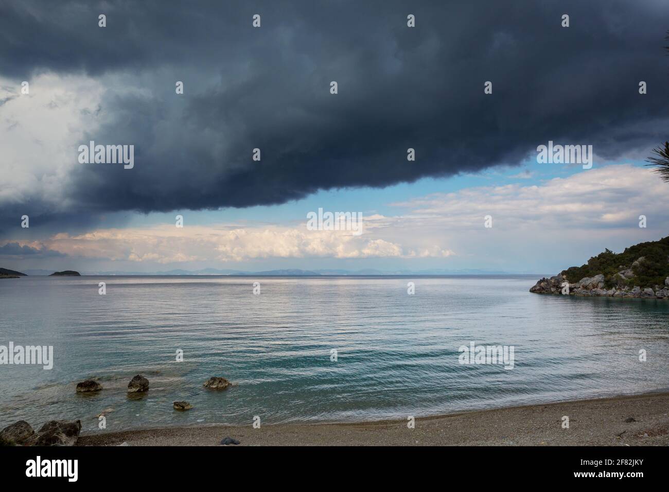 Rainy weather on sea beach Stock Photo - Alamy