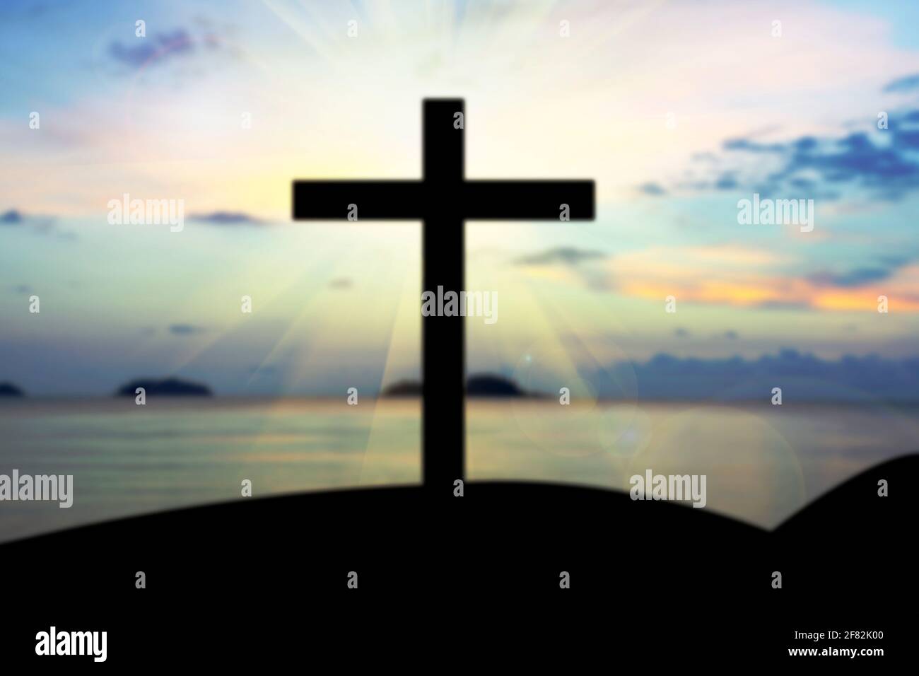 Cross silhouette with bokeh in the blur background during a beautiful ...