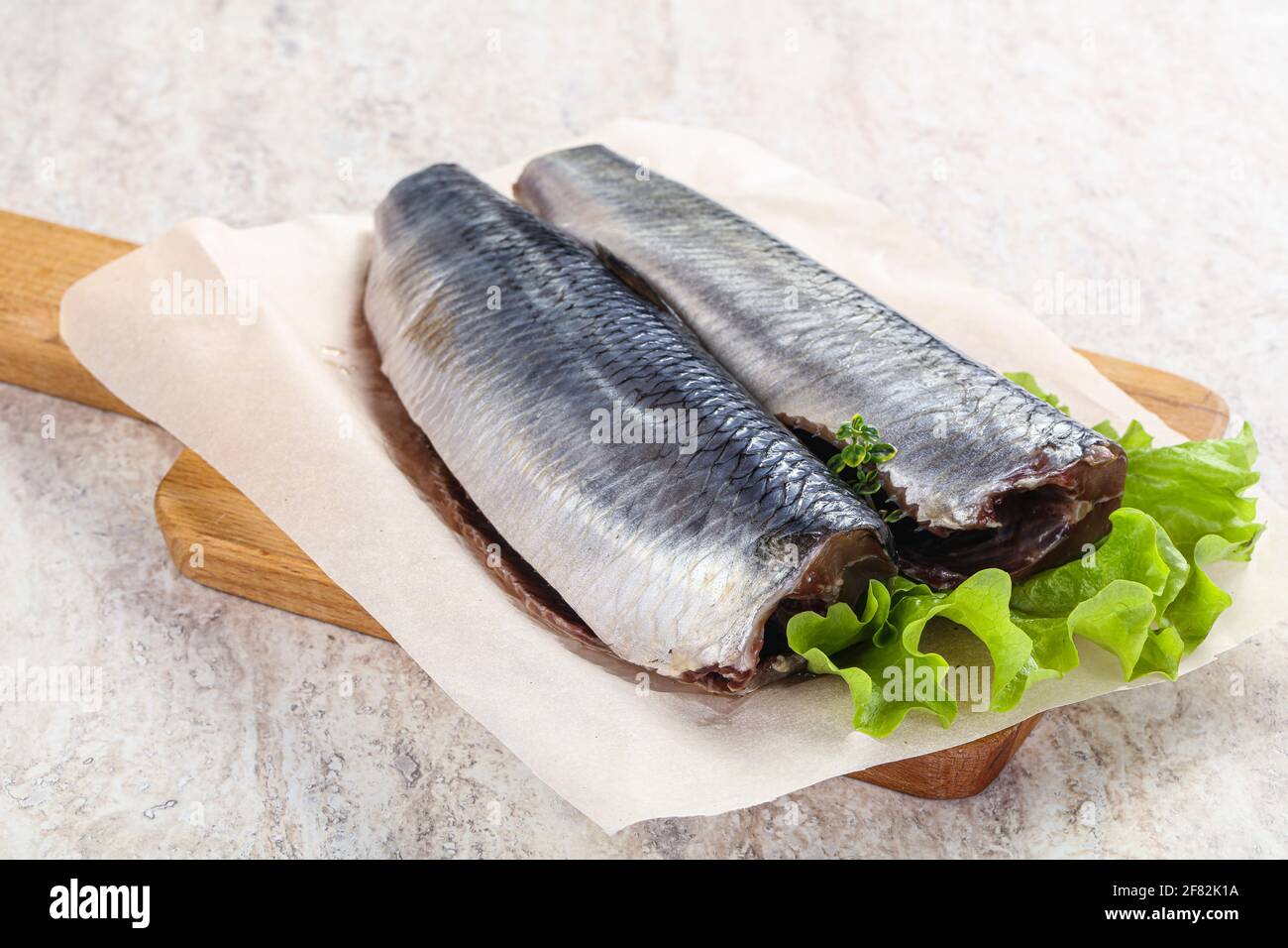 Marinated Herring fillet with skin for cooking Stock Photo - Alamy