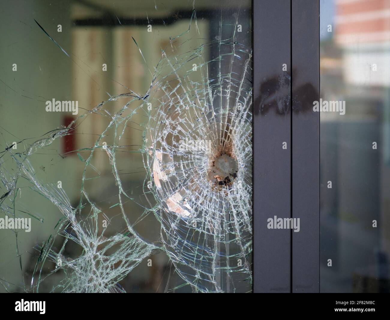 break-in attempt in a shop window Stock Photo - Alamy