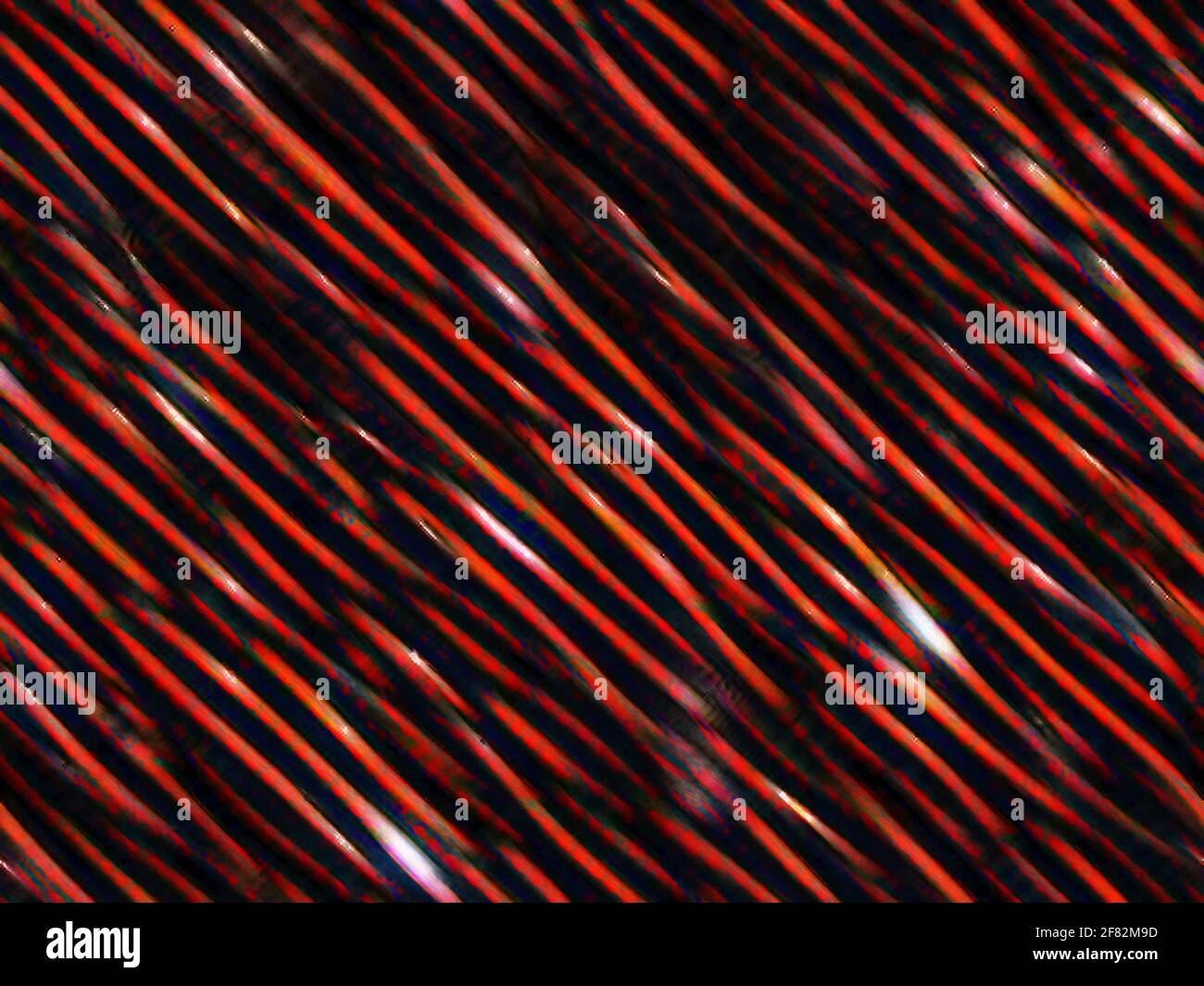 Abstract background with straight red paint strokes on black background ...