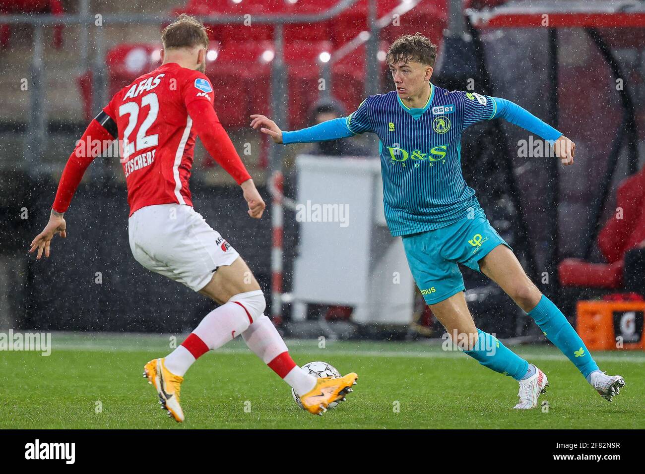 ALKMAAR, NETHERLANDS - APRIL 10: Timo Letschert of AZ and Sven Mijnans ...