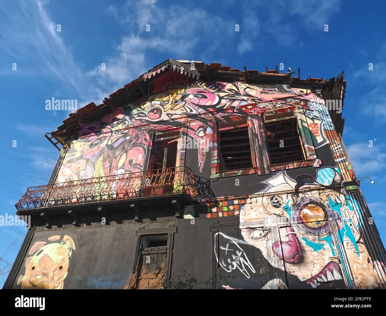 Graffiti art by Dario Silva and Sergio on the old church of Olhao at ...