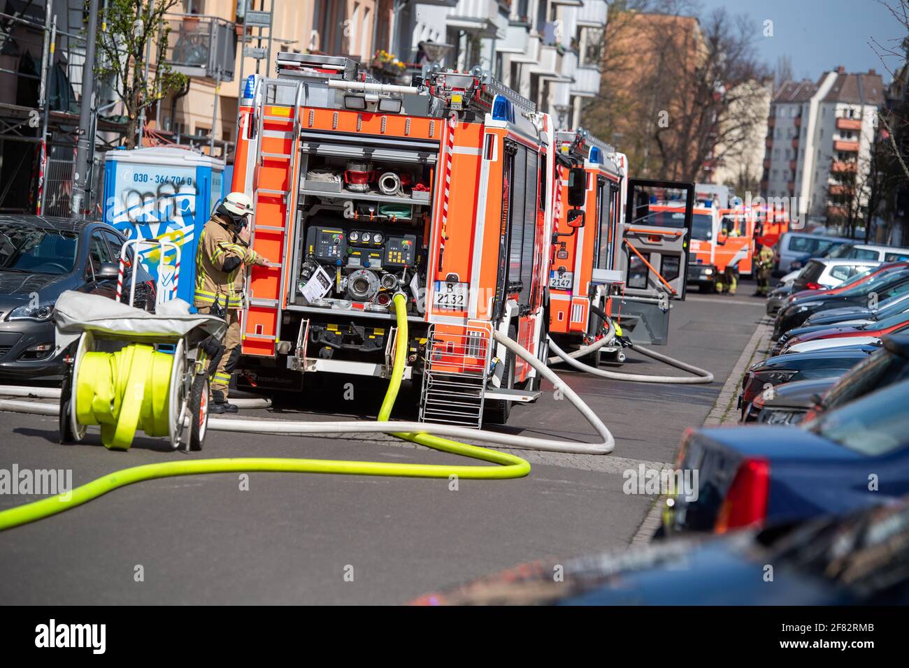 Berlin, Germany. 11th Apr, 2021. Fire engines stand in a street in ...