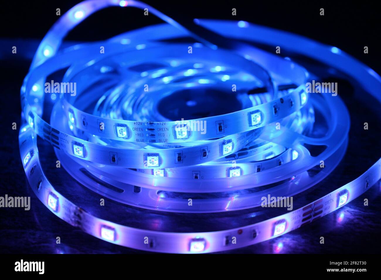 A closeup shot of a roll of illuminated purple led lights Stock Photo ...