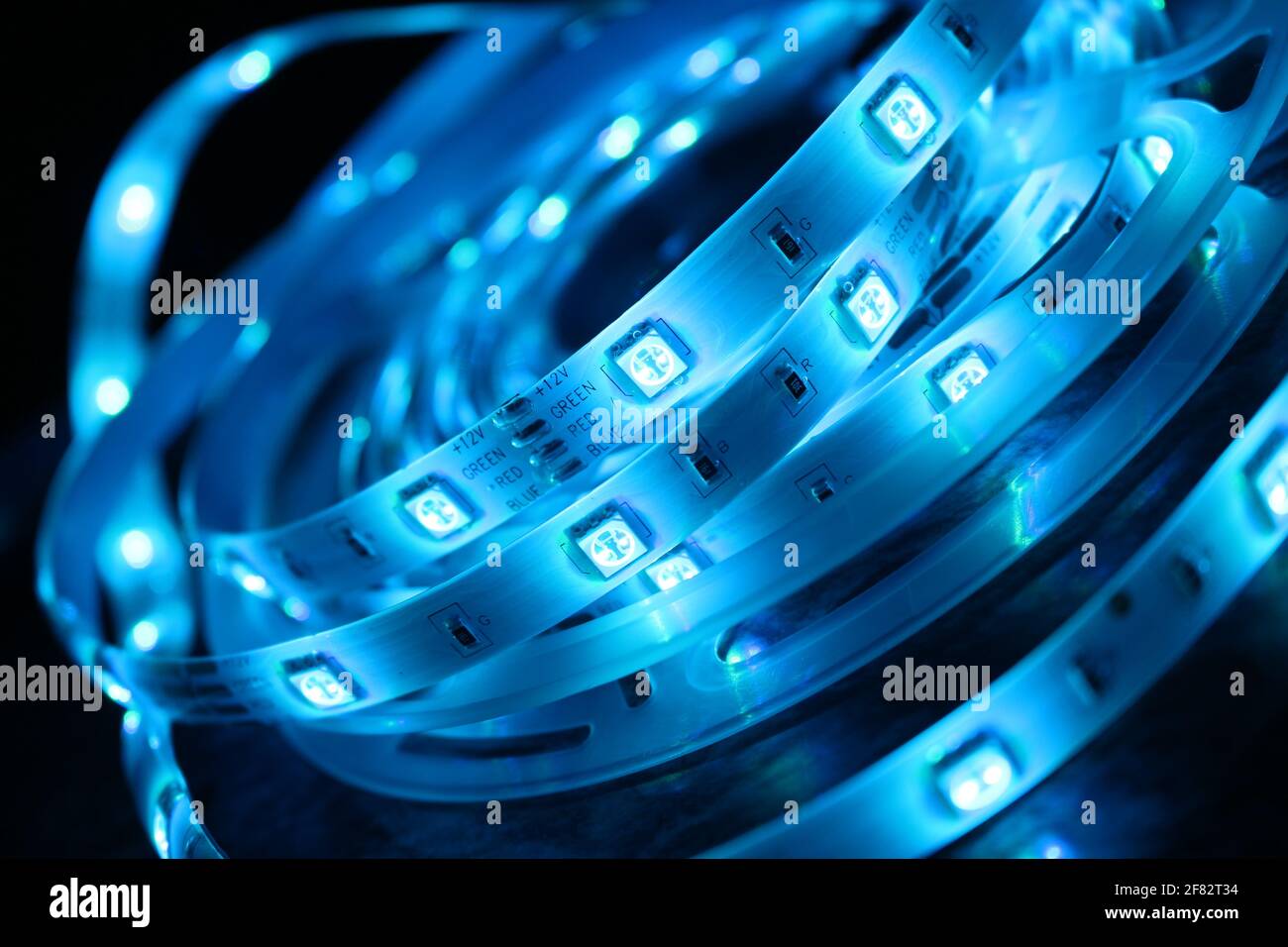 A closeup shot of a roll of illuminated blue led lights Stock Photo - Alamy