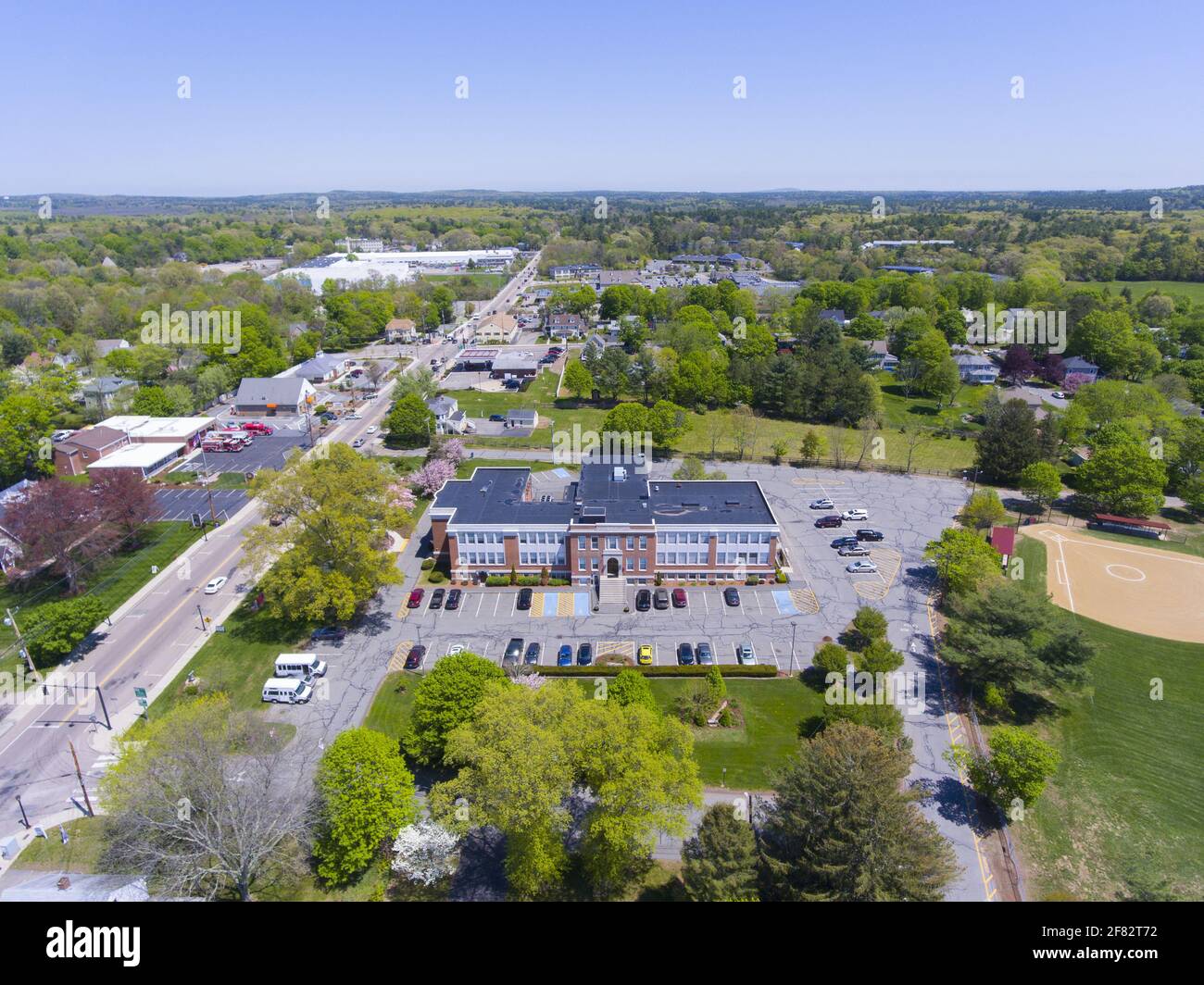 Aerial view of Millis town hall on Main Street at the town center of ...