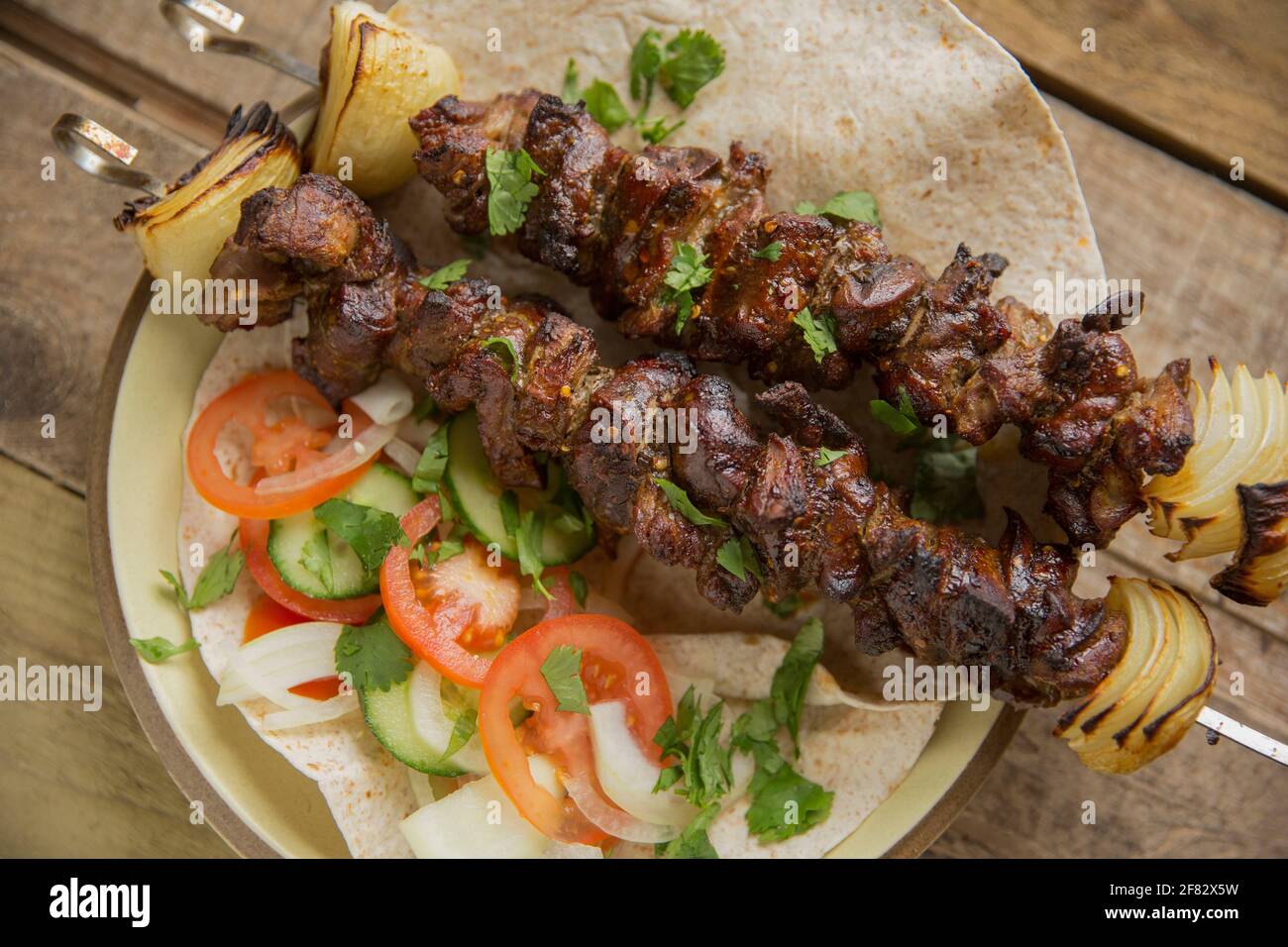 Homemade kebabs of rolled British lamb and British lambs liver that ...