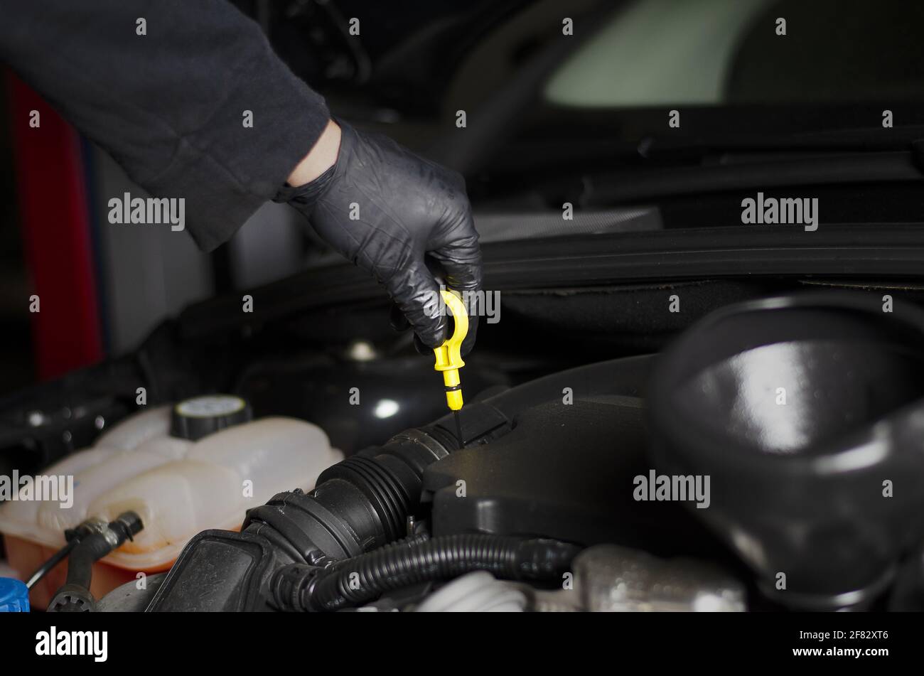 Repairing car changing motor oil hi-res stock photography and images ...