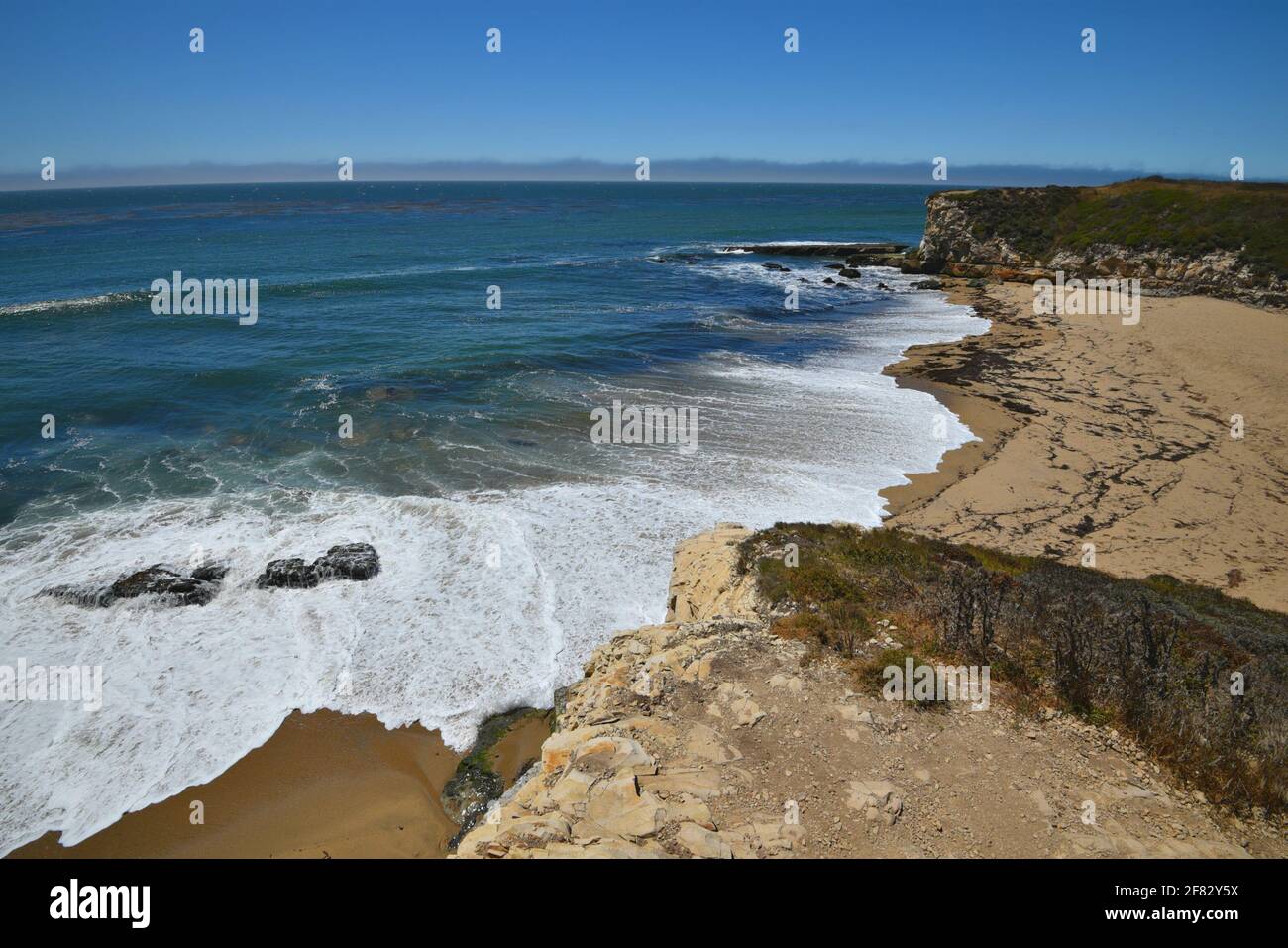Scenic rocky seascape with an isolated sandy beach at Wilder Ranch ...