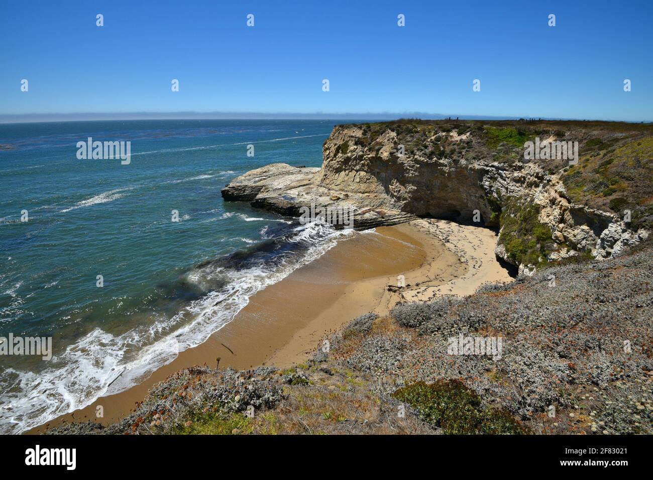 Scenic rocky seascape with an isolated sandy beach at Wilder Ranch ...