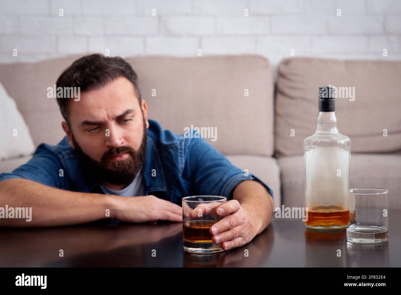 Sad depressed addicted drunk guy having problem, suffer from alcohol ...