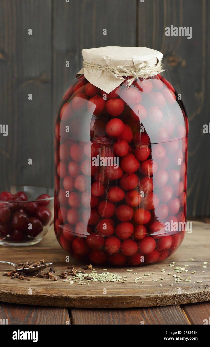 Sweet cherries stewed compote canned in plastic free glass jar on ...